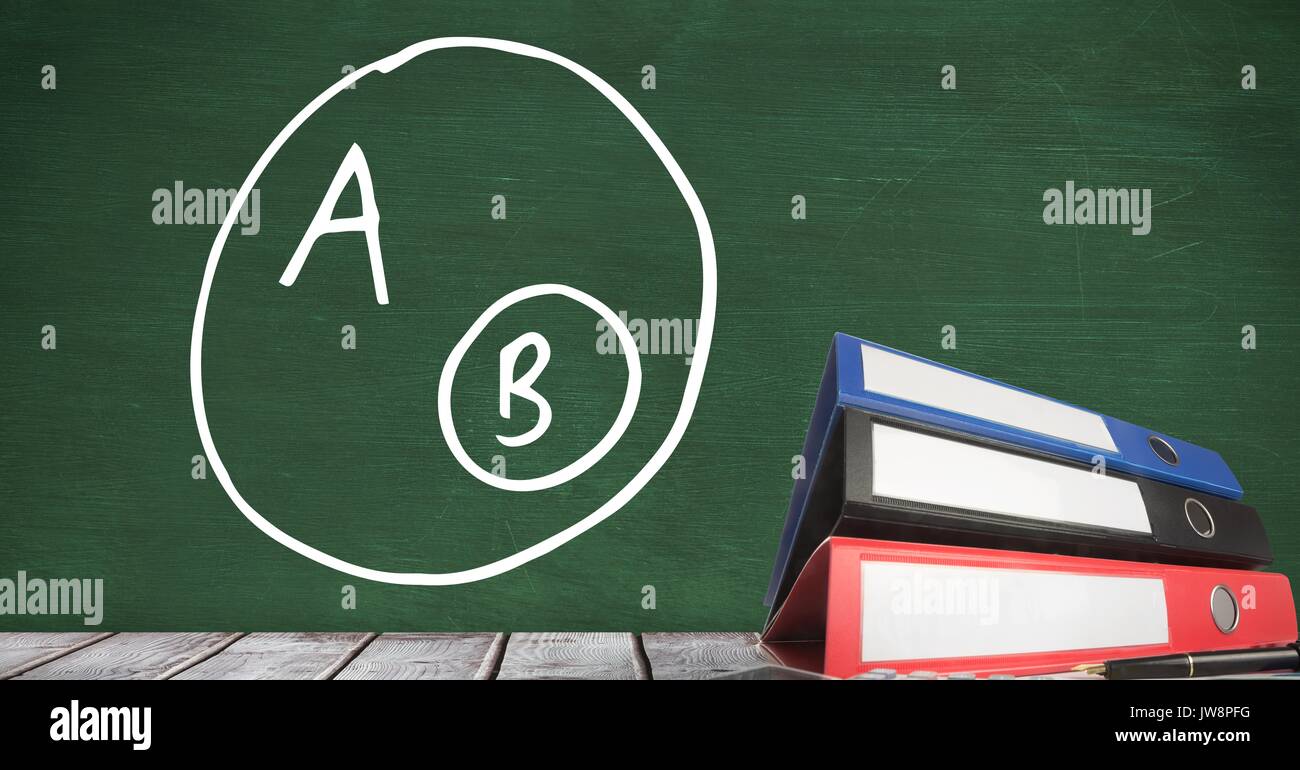 Digital composite of Folders on Desk foreground with blackboard ...