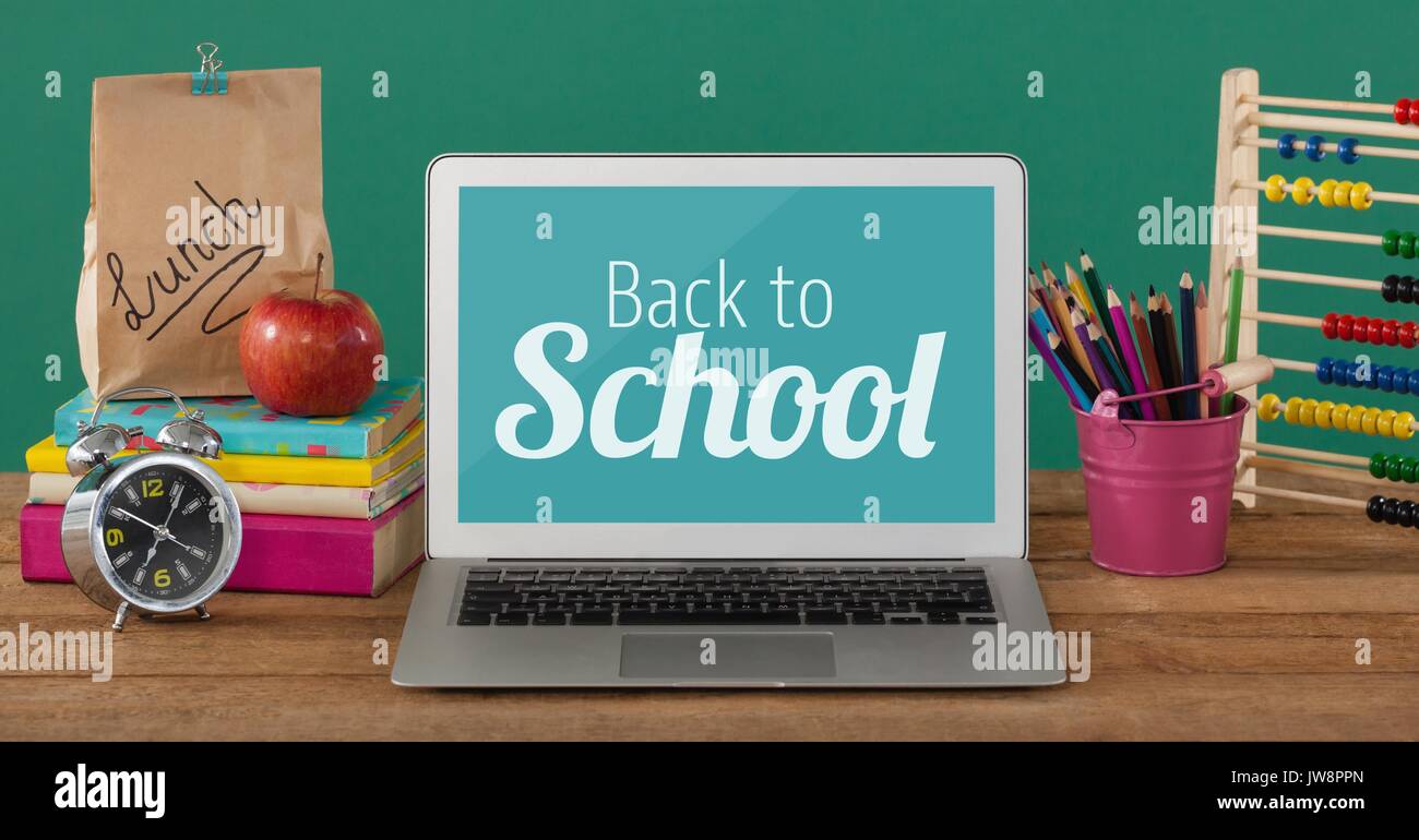 Digital composite of Computer on a school table with back to school ...