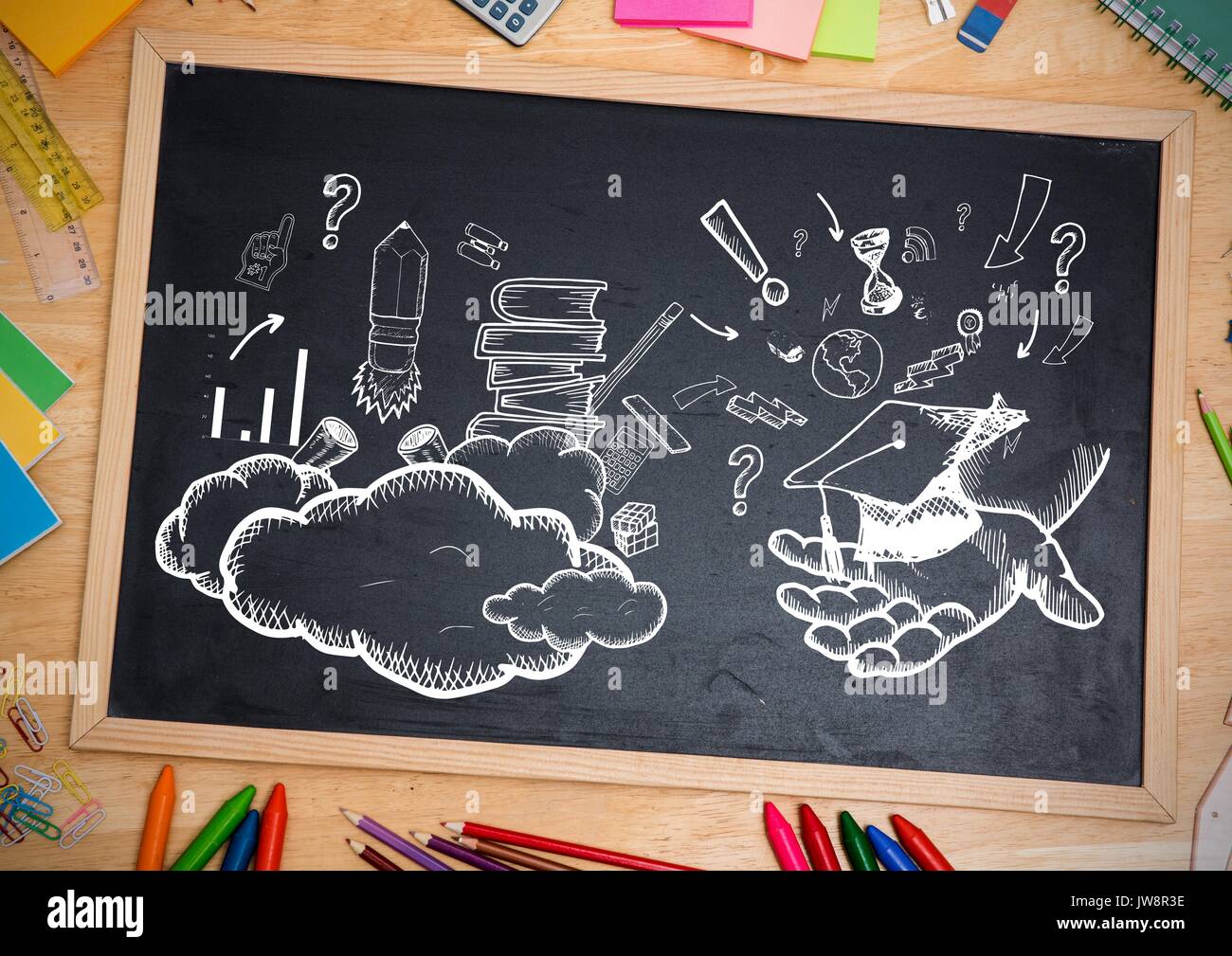 Digital composite of Education drawings on blackboard Stock Photo - Alamy