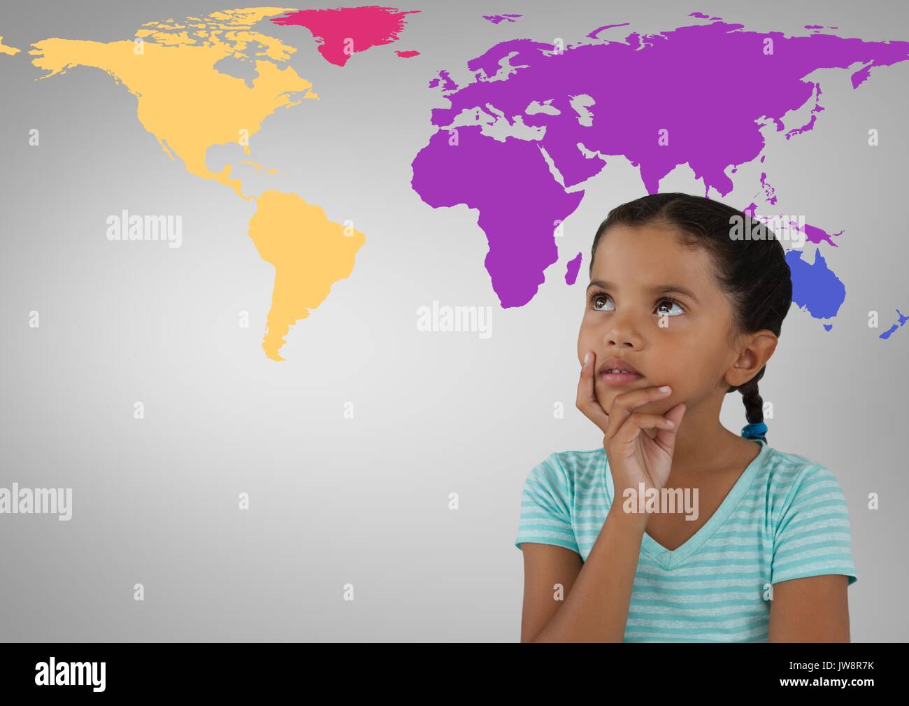 Digital composite of Girl thinking in front of colorful world map Stock ...