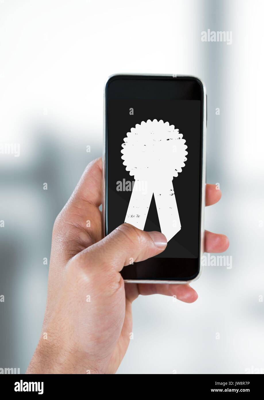 Digital composite of Person holding a phone with a trophy icon Stock ...