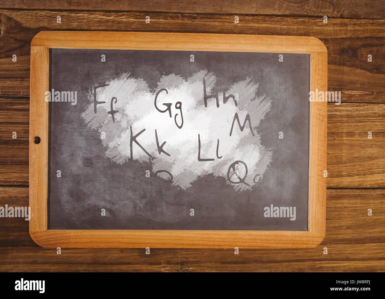 Digital composite of letters on blackboard Stock Photo - Alamy