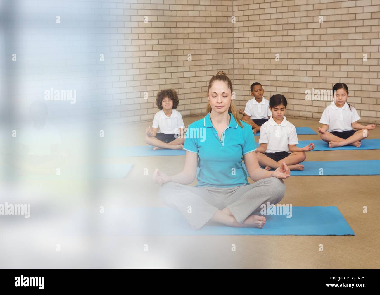 Children meditating classroom hi-res stock photography and images - Alamy