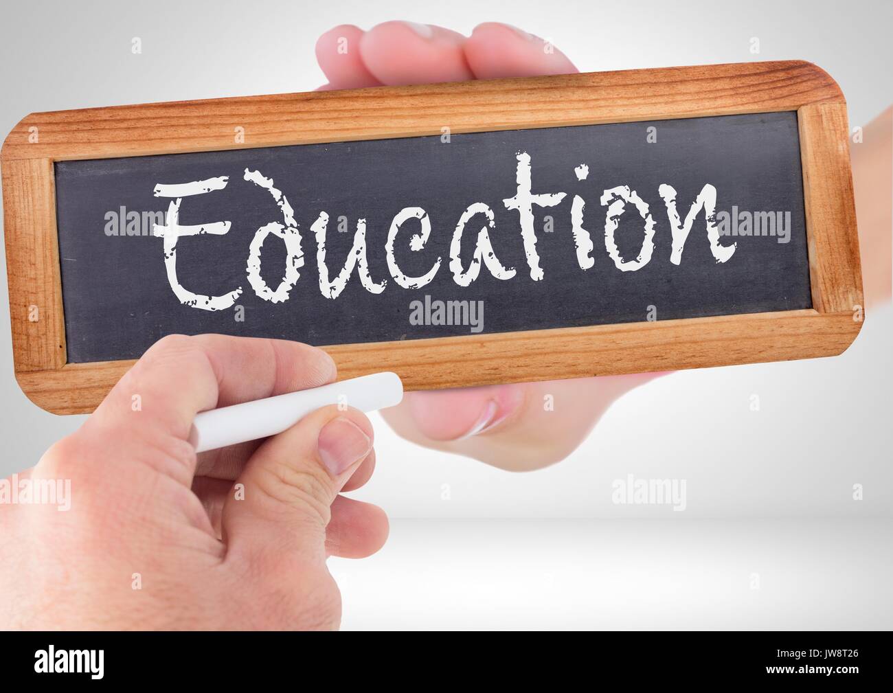 Digital composite of Hand writing Education text on blackboard Stock ...