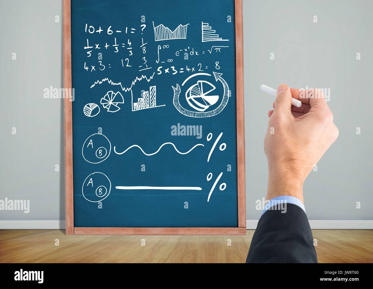 Digital composite of Hand writing math diagrams on blackboard Stock ...