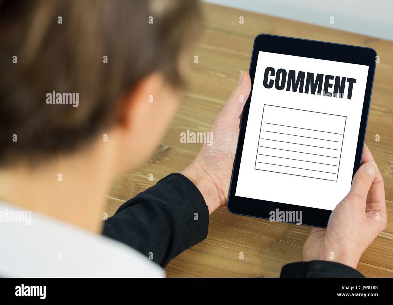 Digital composite of Comment text and graphic on tablet screen with ...