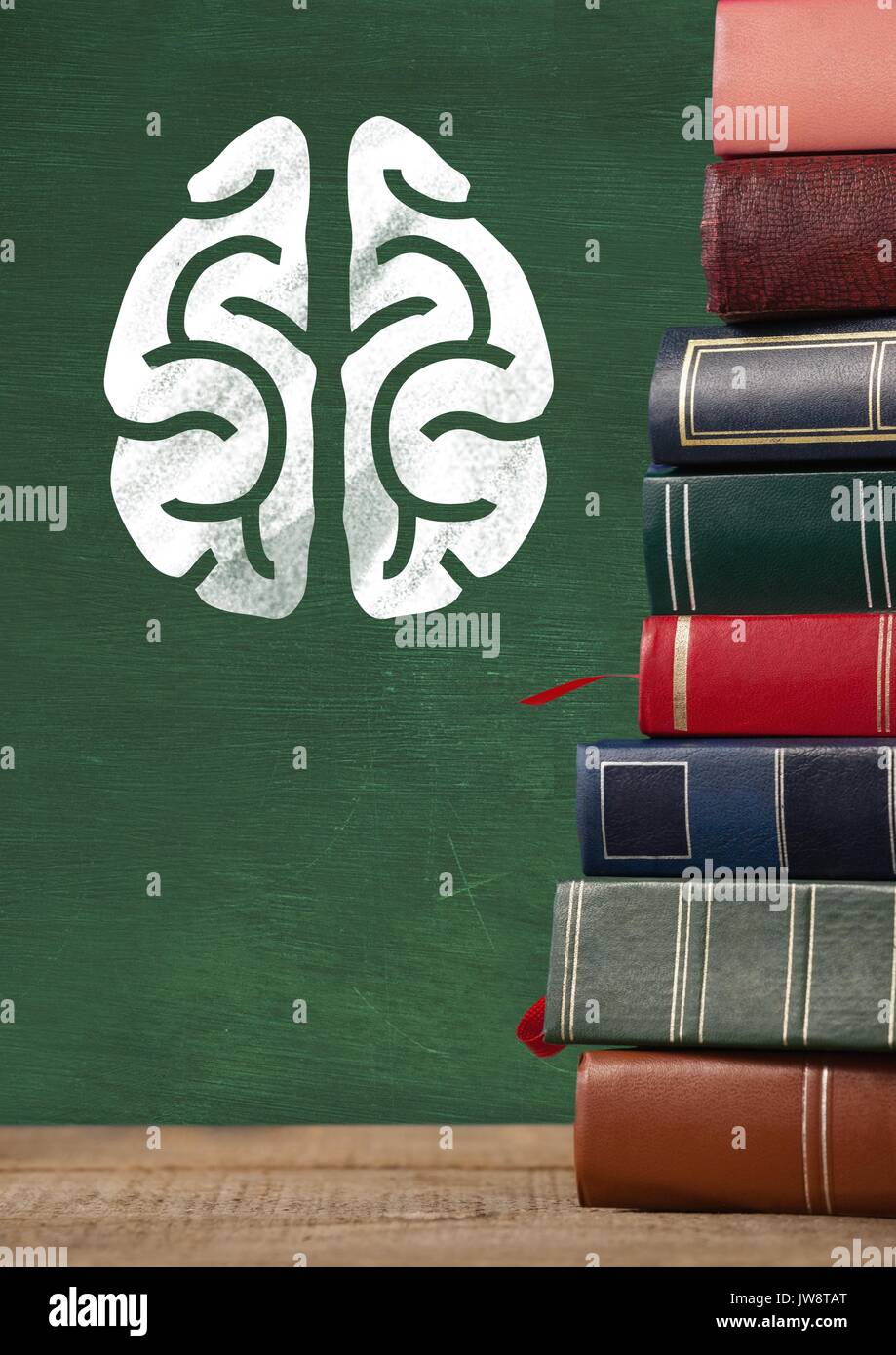 Digital composite of Books on Desk foreground with blackboard graphics ...