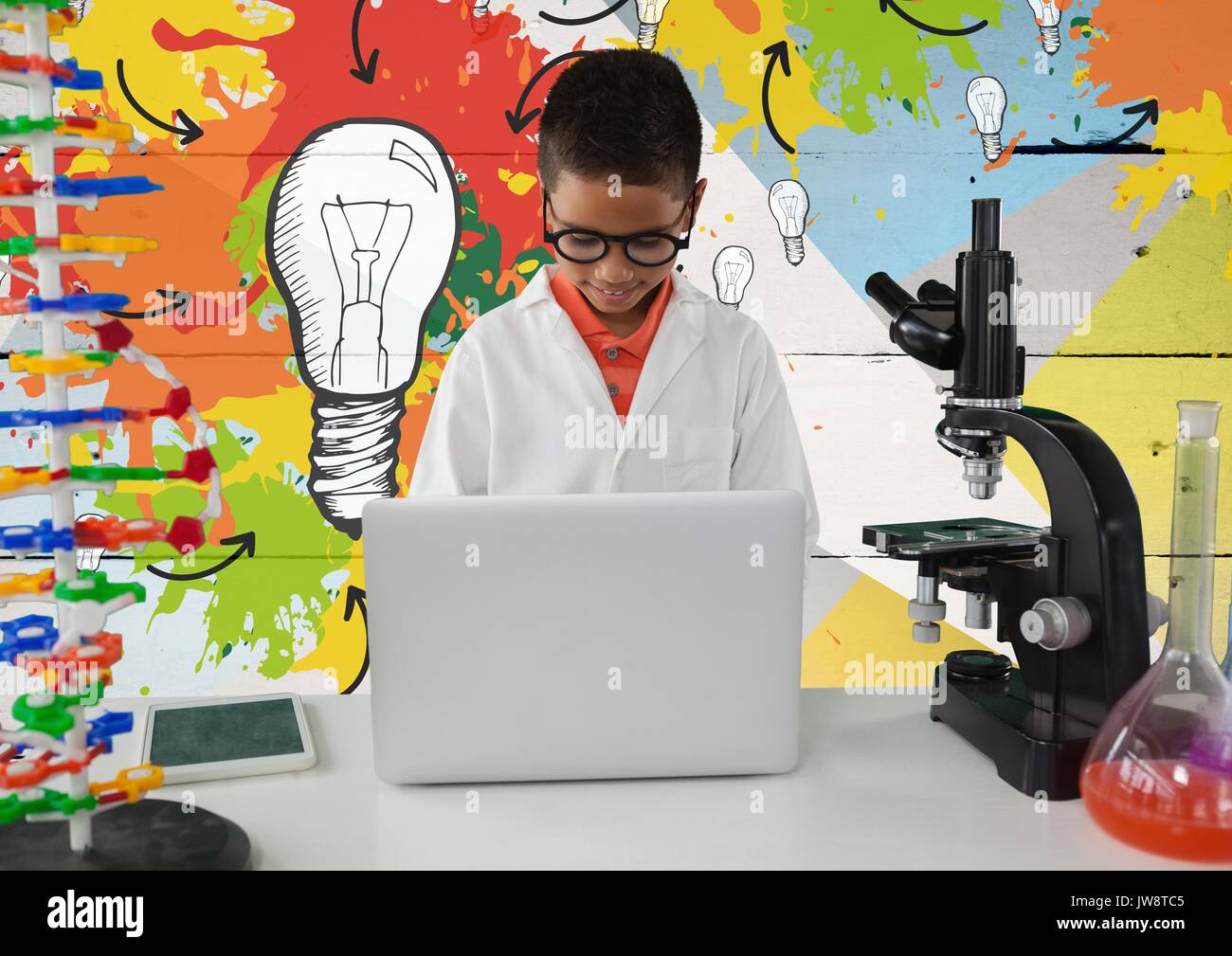 Digital composite of Schoolboy scientist in lab with colorful light ...