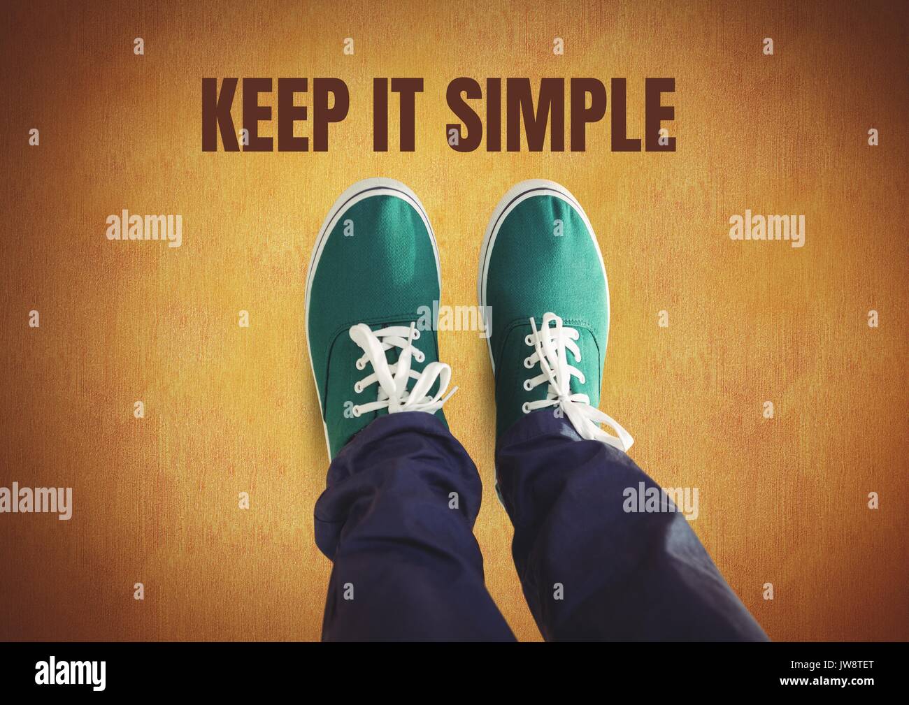 Digital composite of Keep it simple text and Green shoes on feet with ...