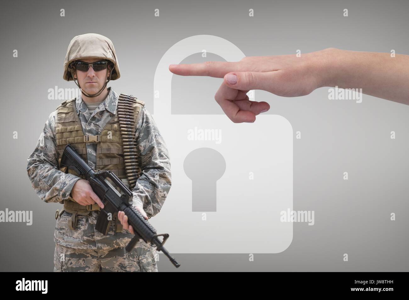 Digital composite of Hand pointing at soldier against grey background ...
