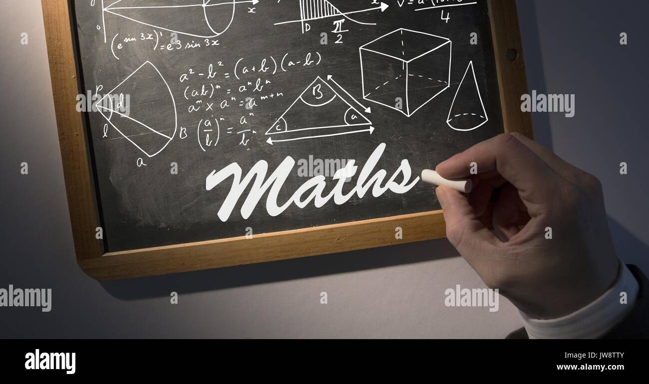 Digital composite of Hand writing maths and diagrams on blackboard ...