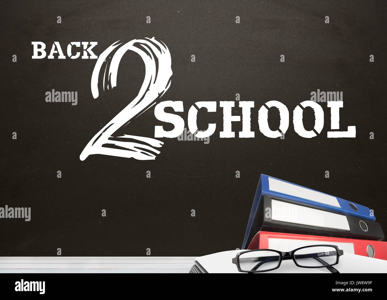 Digital composite of Folders on Desk foreground with blackboard ...