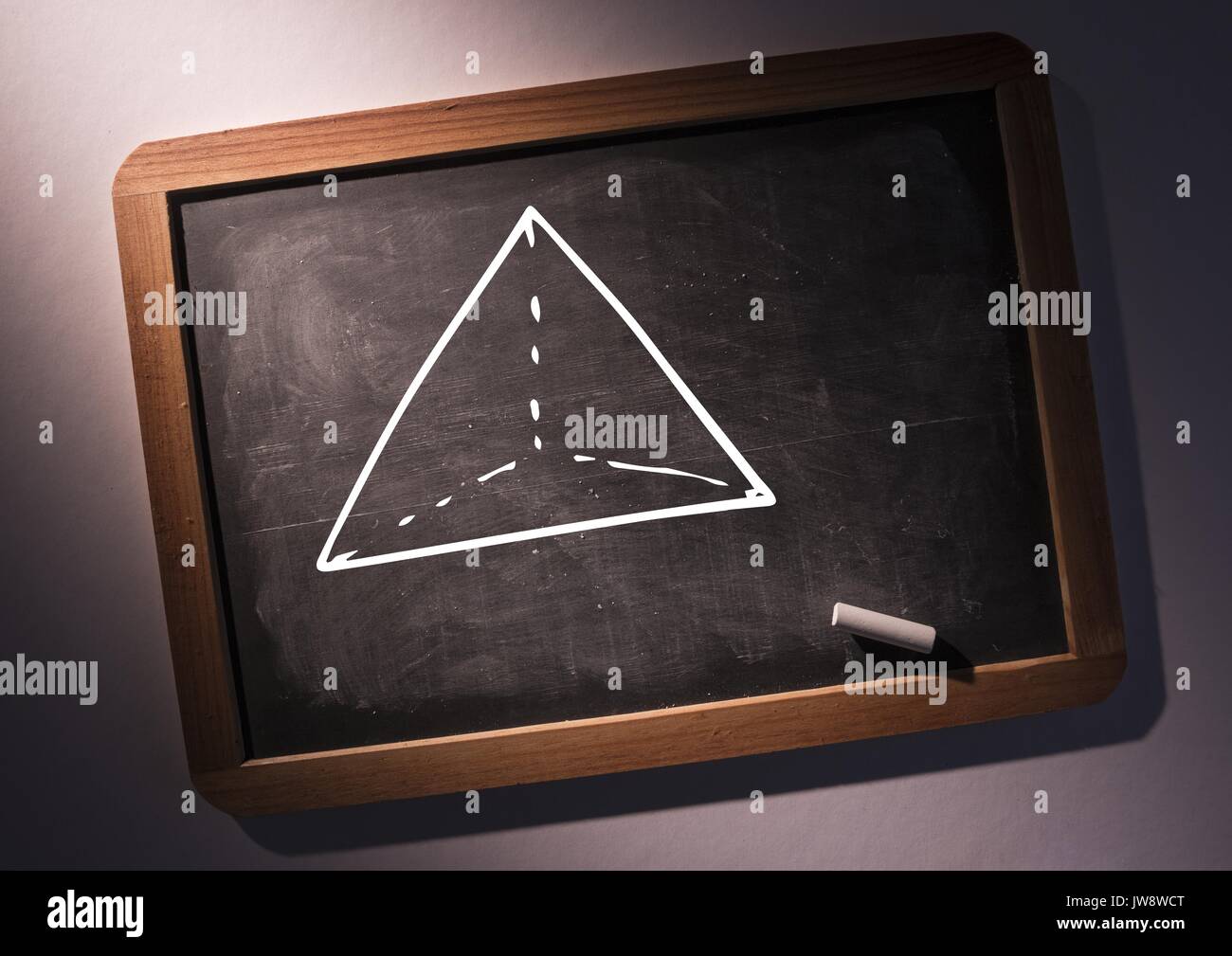 Digital composite of pyramid on blackboard Stock Photo - Alamy