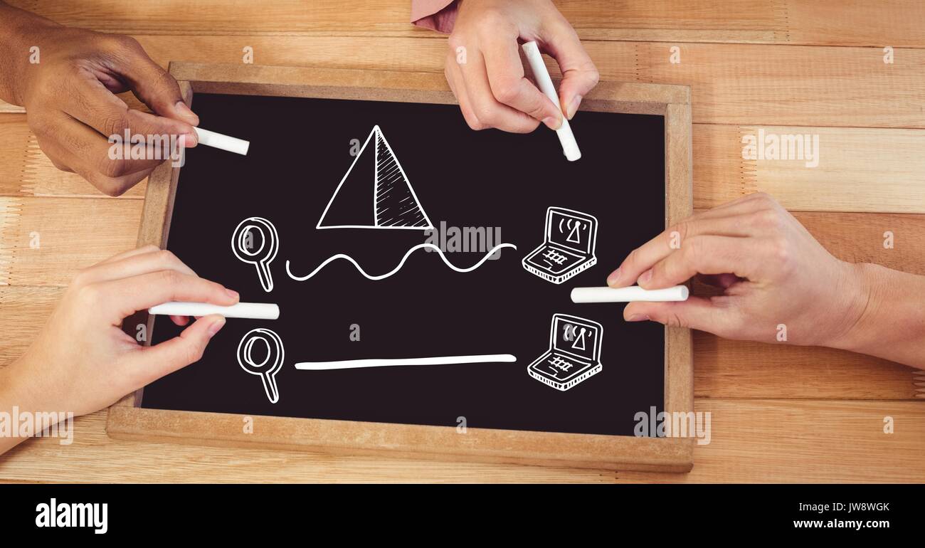 Digital composite of Hands drawing computer diagrams on blackboard ...