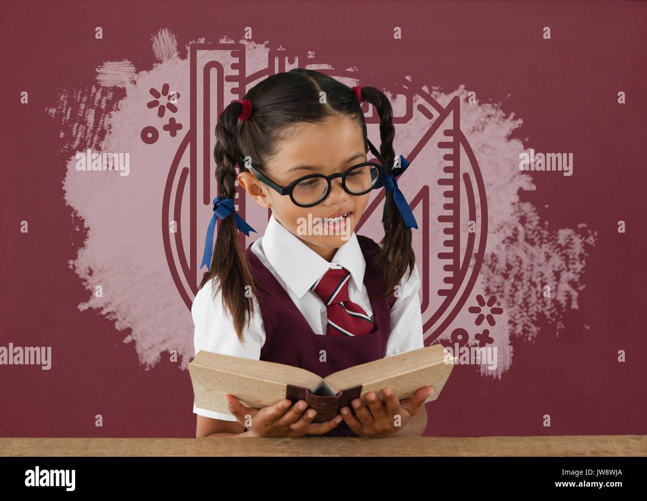 Digital composite of Student girl at table reading against red ...