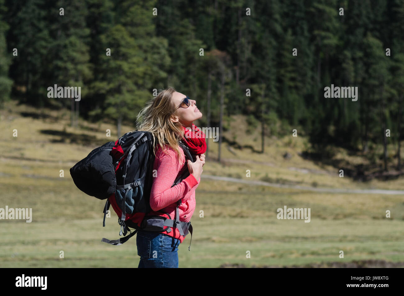Back view caucasian female hiker hi-res stock photography and images ...