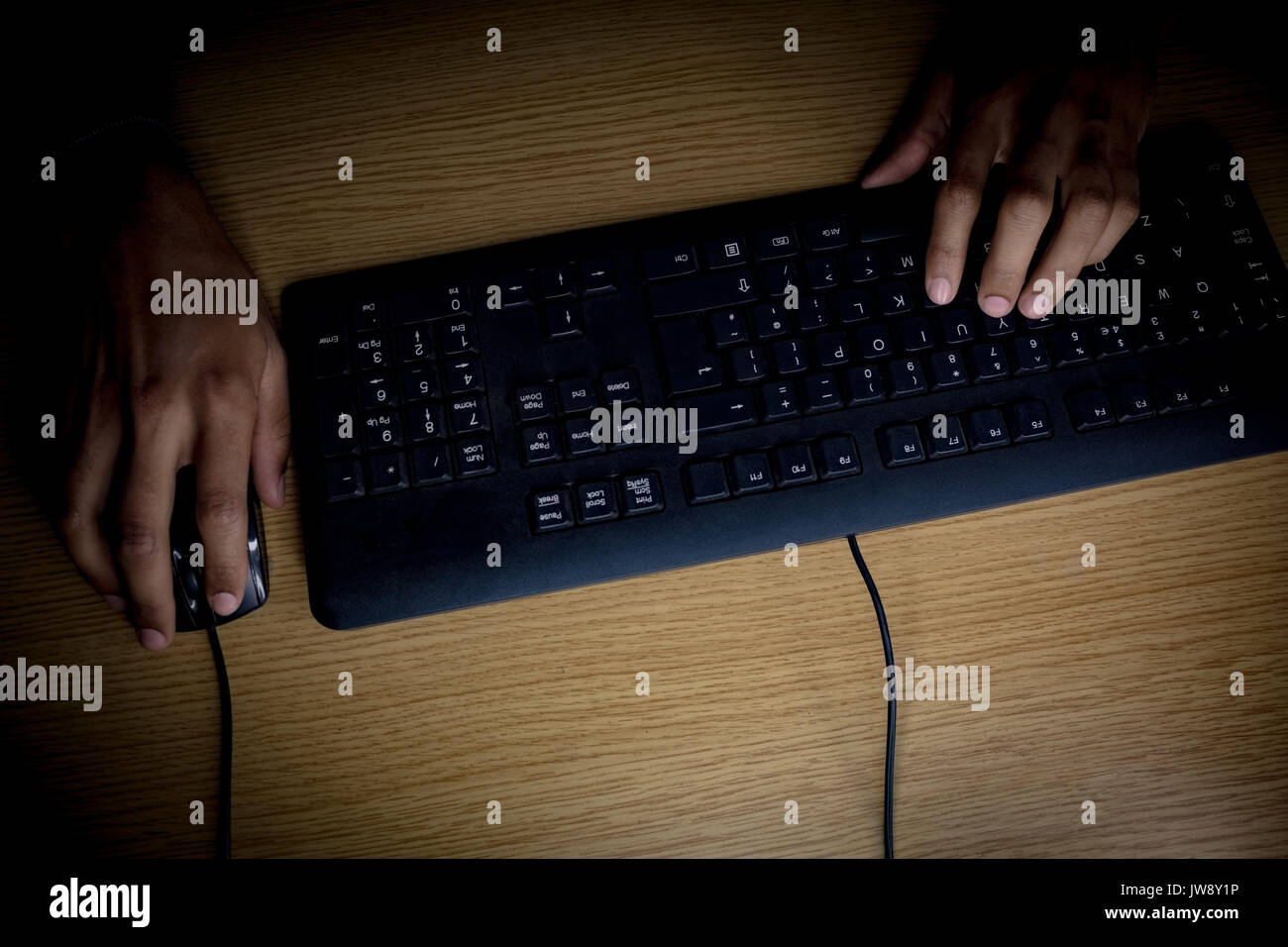 Overhead view of executive working at desk in office Stock Photo - Alamy