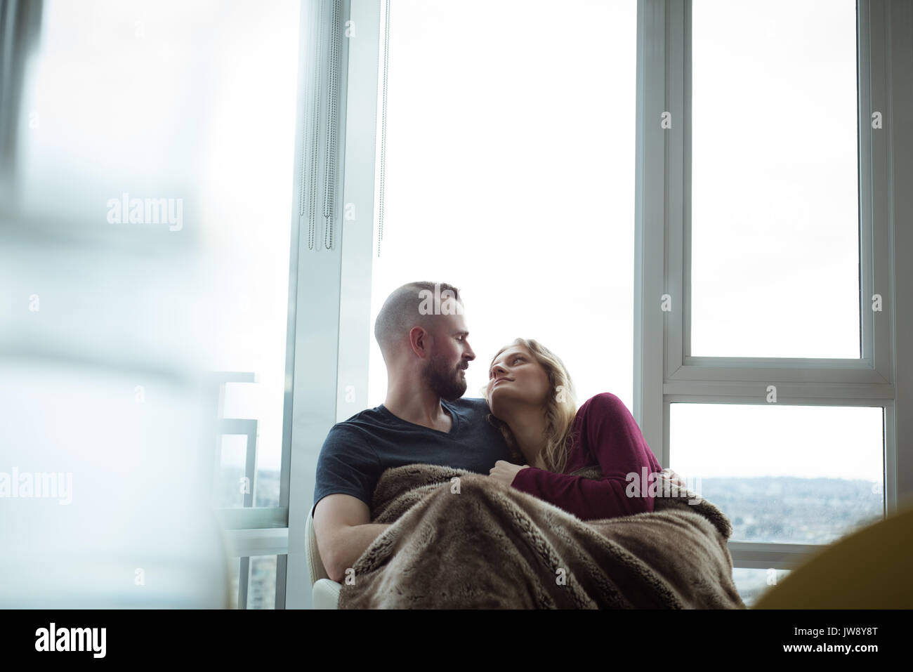 Pretty young couple hugging talking hi-res stock photography and images ...