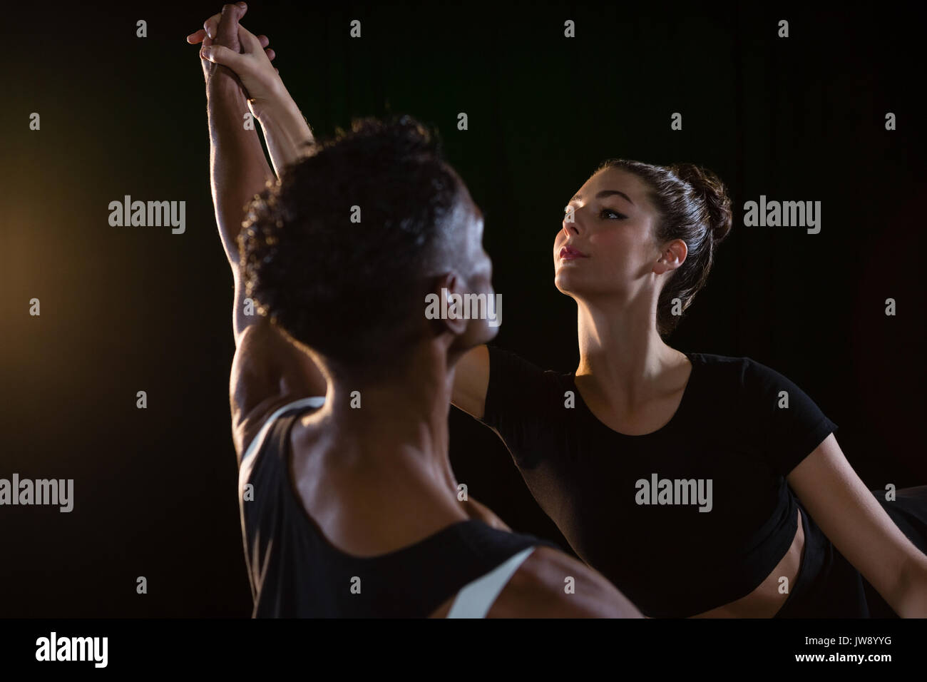 Ballet partners practicing ballet dance in stage Stock Photo - Alamy