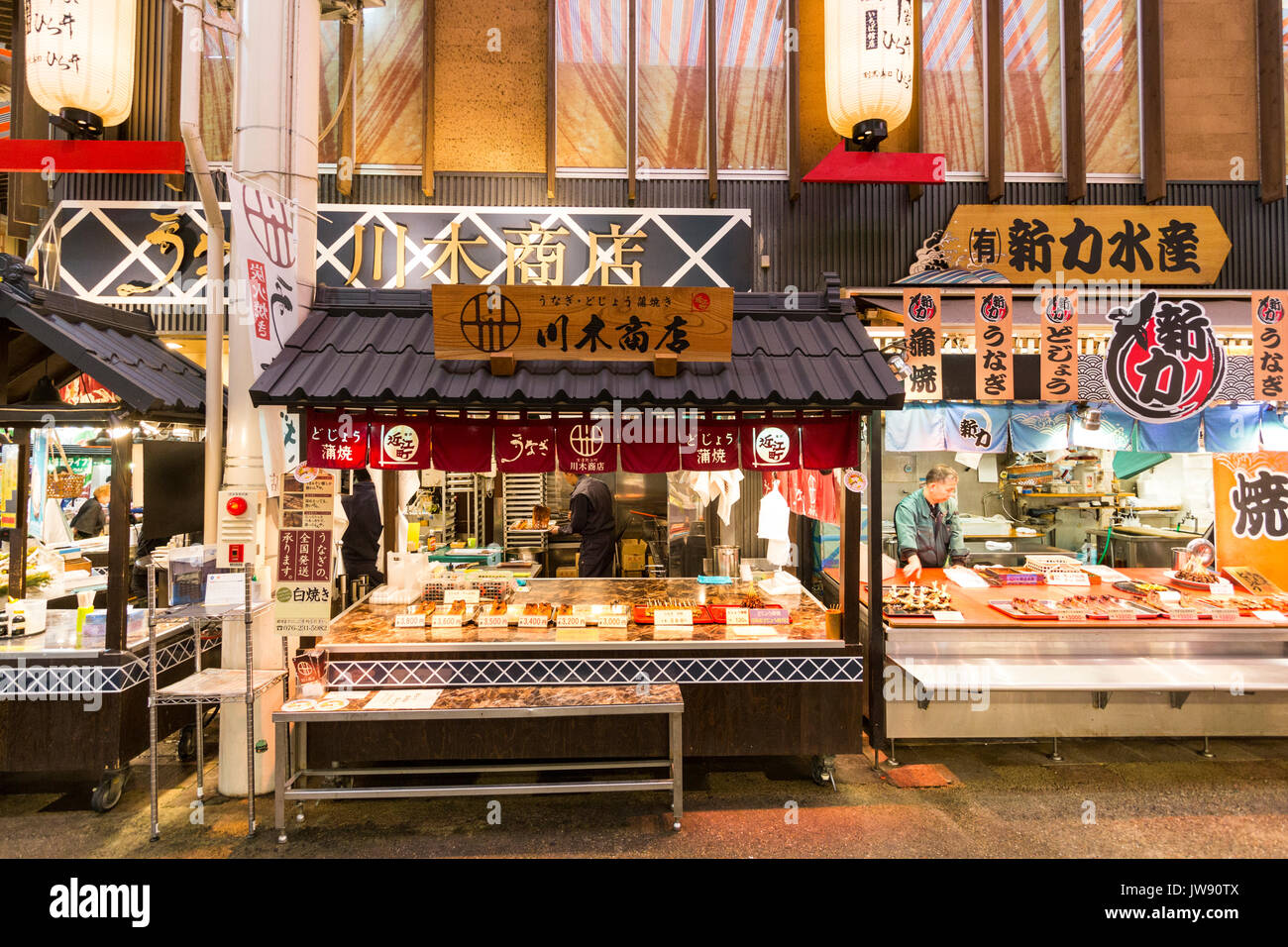 Two take-away seafood shops with open counters side by side in the ...