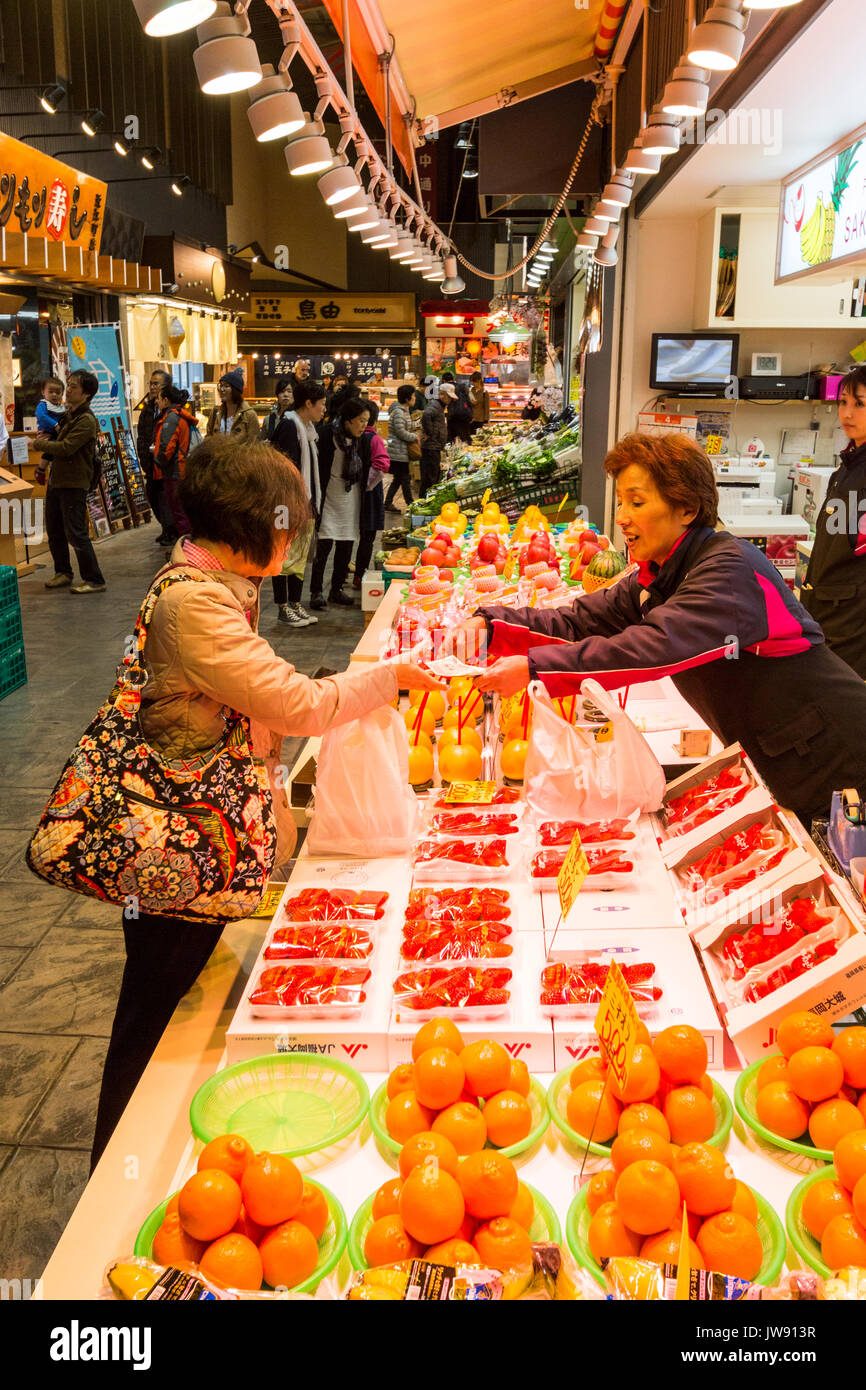 Japan, Kanazawa. Famous Omi-cho fresh food indoor market. Fruit stall ...