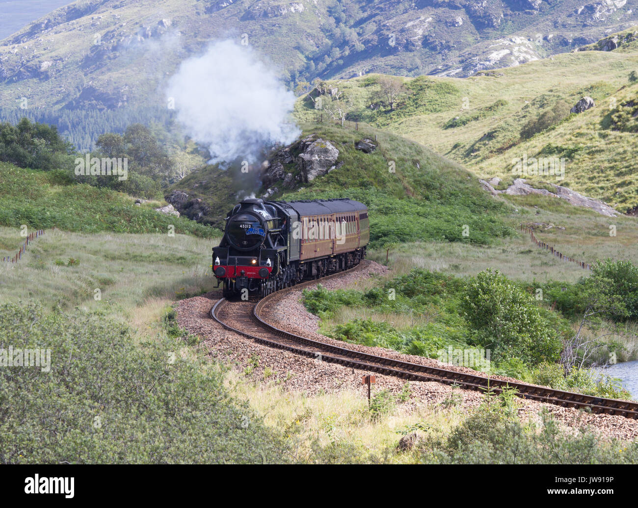 The Jacobite Steam train climbs out of Glenfinnan heading for Mallaig ...