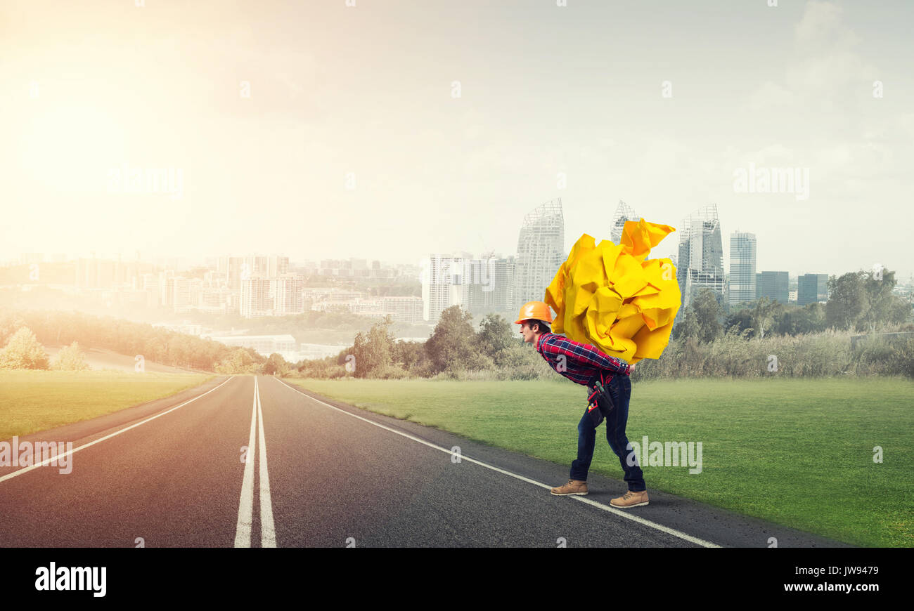 Engineer man carry load Stock Photo - Alamy