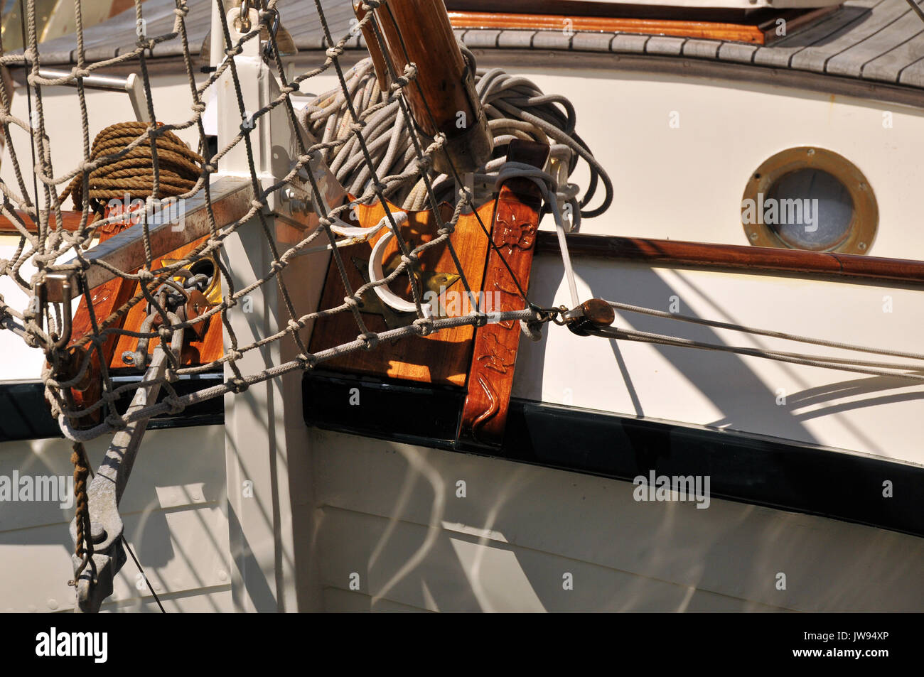 the bow and bowsprit of a traditional or classic sailing yacht with ...