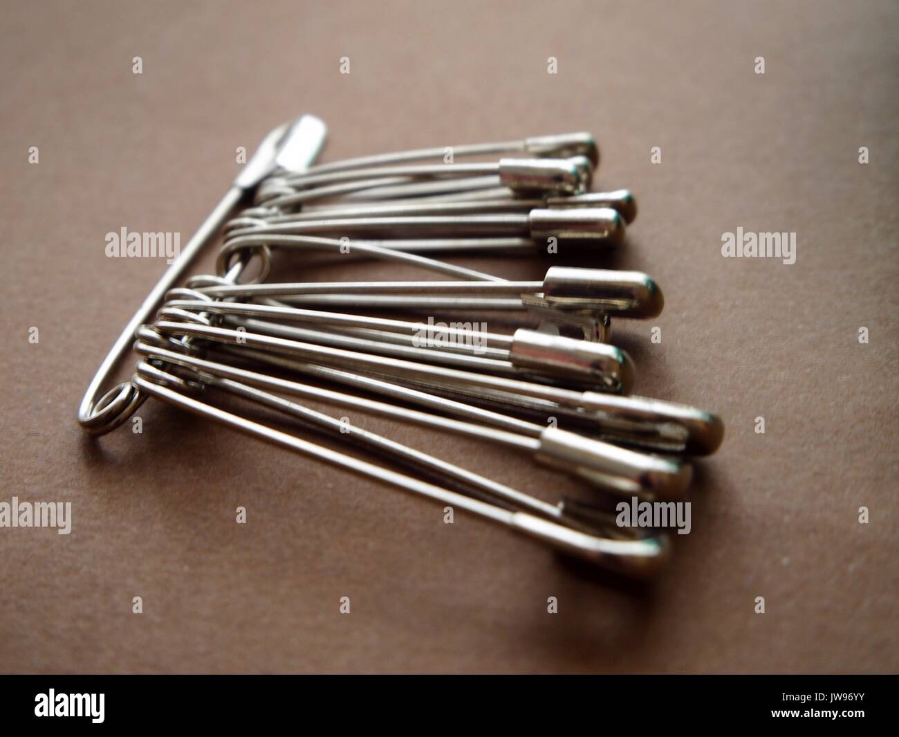 Old safety pin needle metal hi-res stock photography and images - Alamy