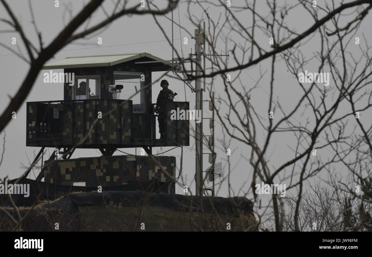 A South Korean watch tower is manned with soldiers on the border with ...