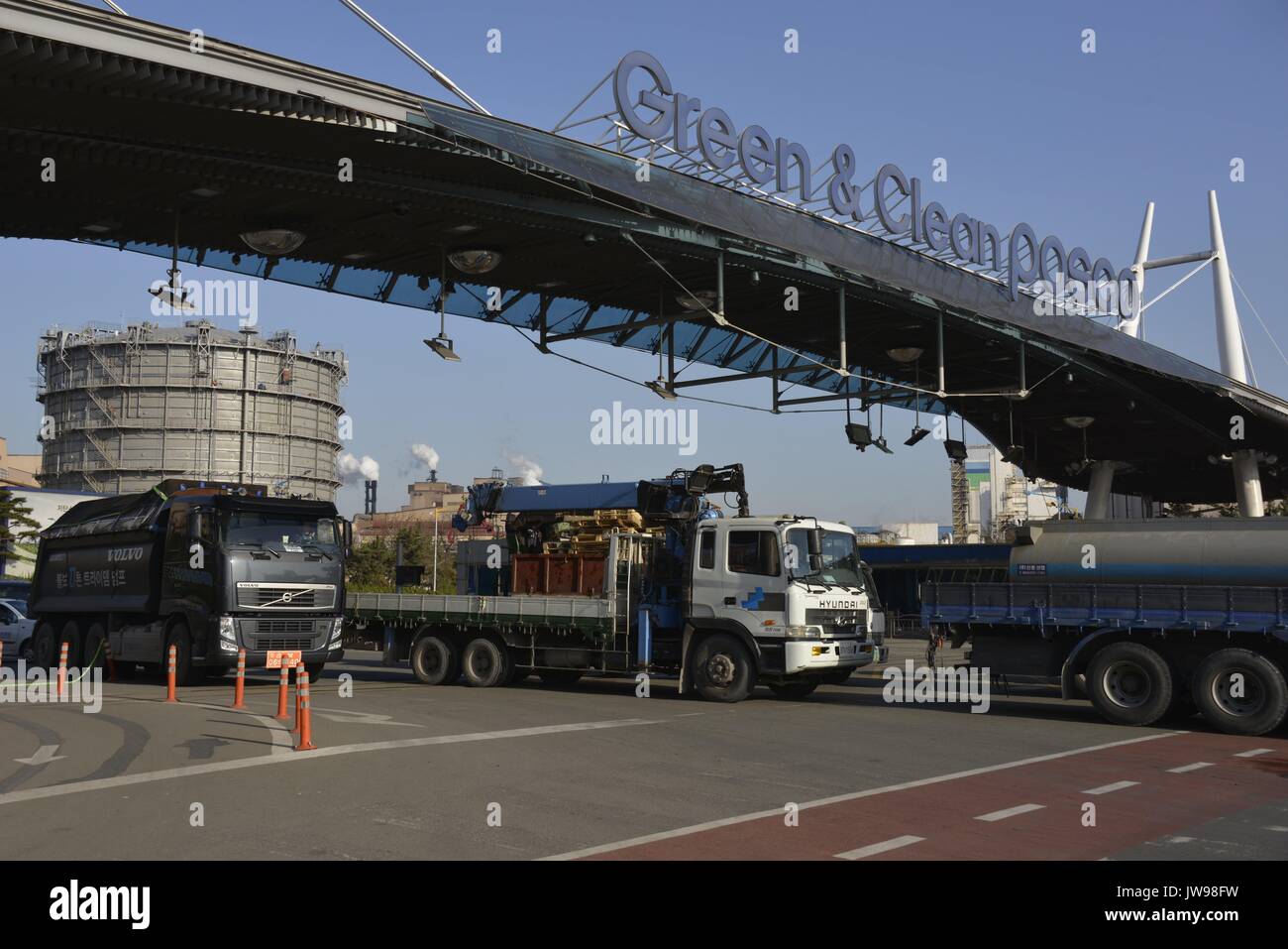 Trucks are seen leaving the large South Korean POSCO (Pohang Iron and ...