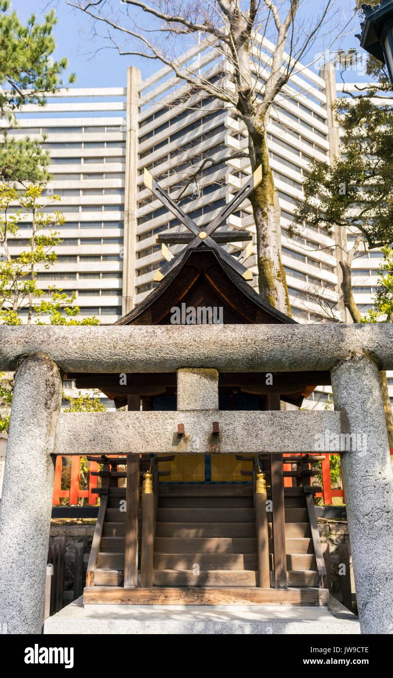 Shinto shrine in Kyoto, Japan with huge modern building in the ...
