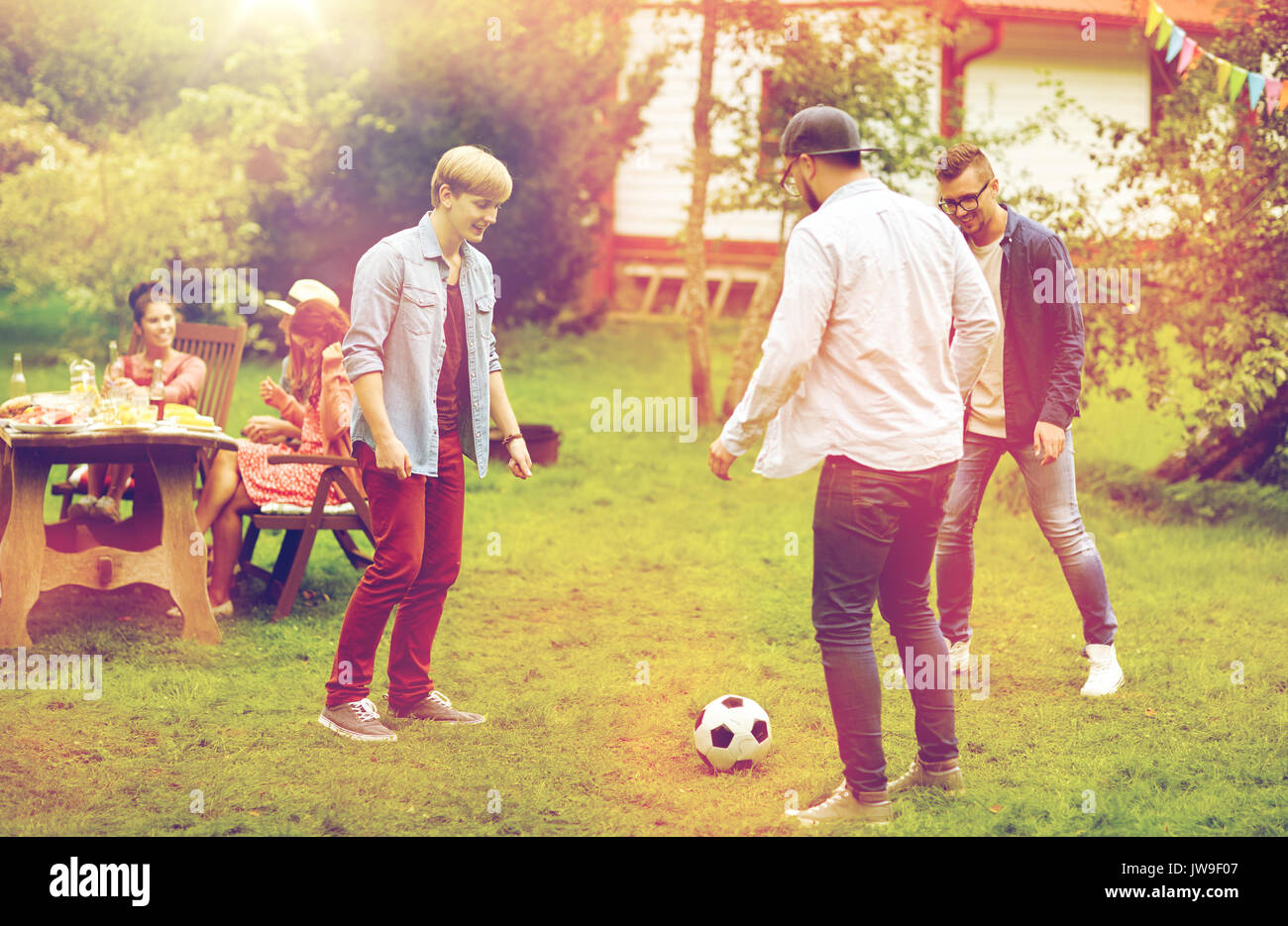 Group of friends football game hi-res stock photography and images - Alamy