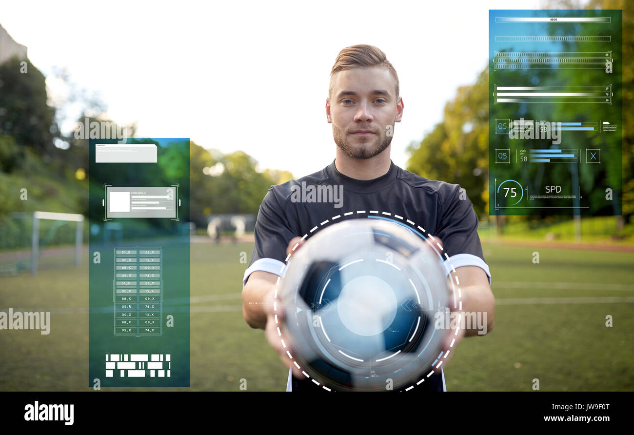 soccer player with ball on football field Stock Photo - Alamy