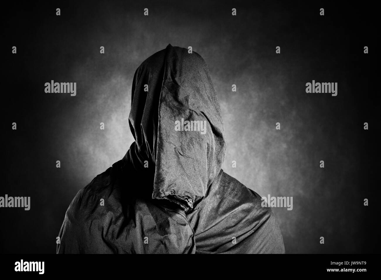 Ghostly figure in the dark Stock Photo - Alamy