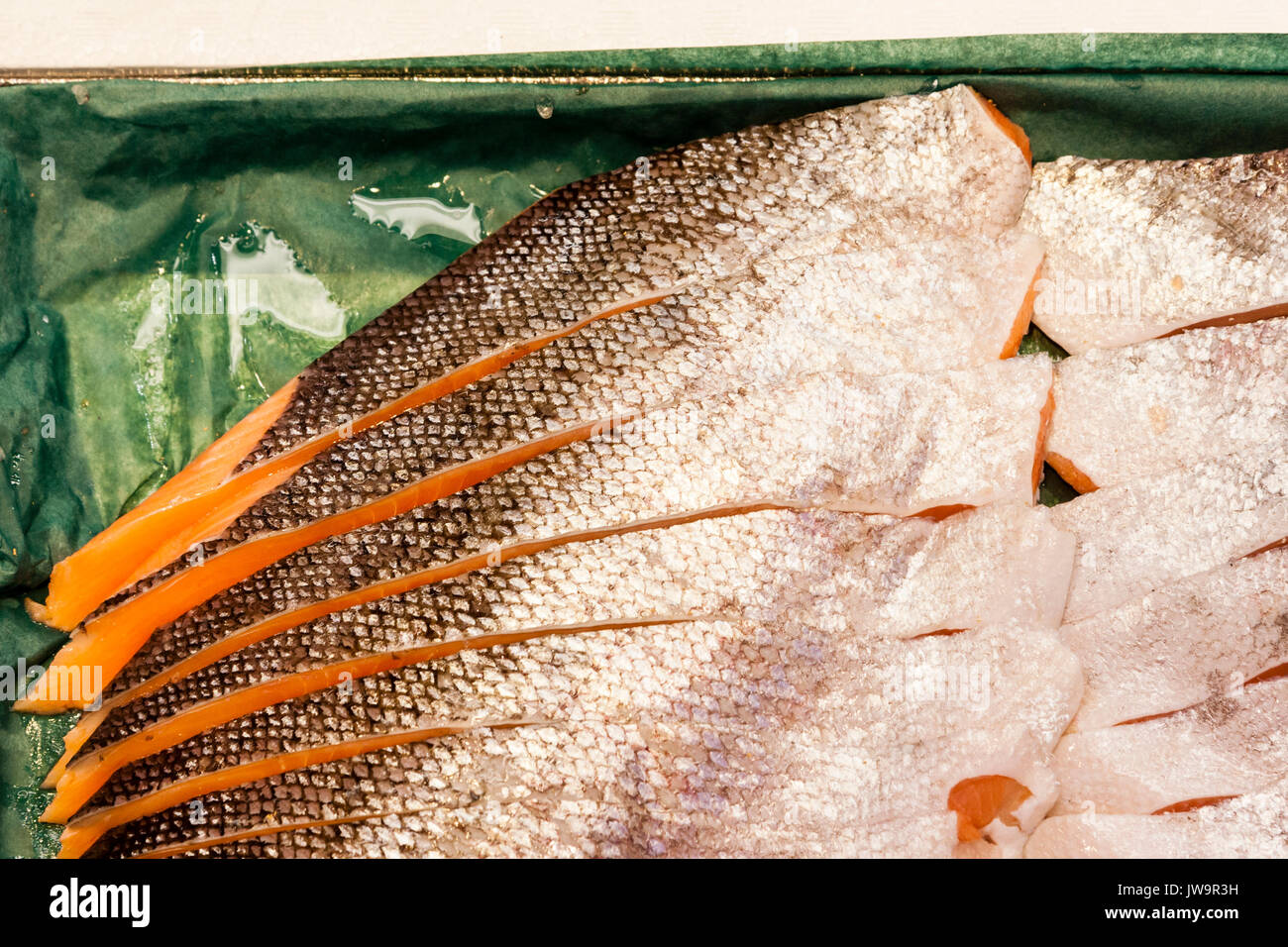 Japan, Kanazawa. Omi-cho fresh food indoor market. Sliced Fish cut into ...