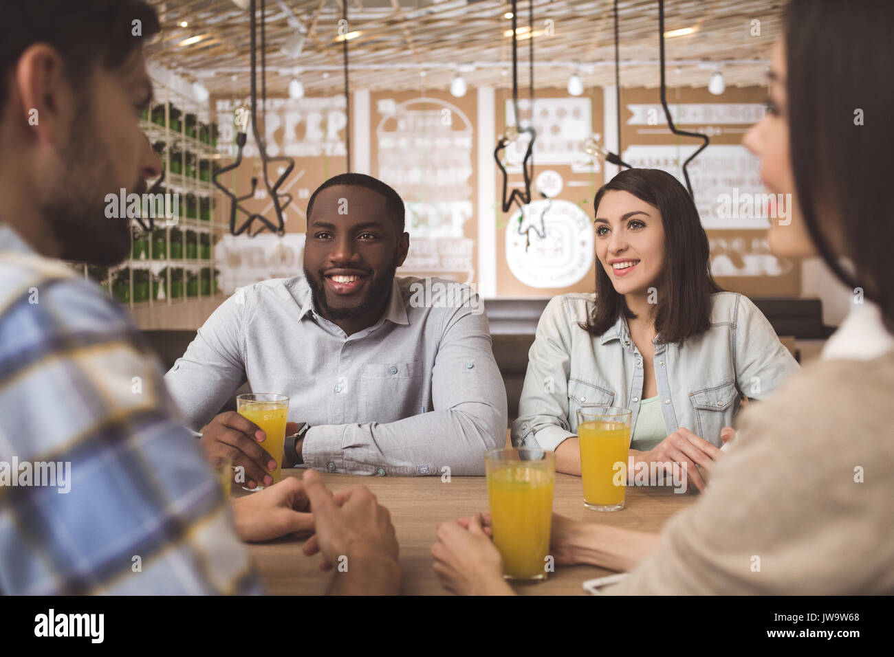 Multicultural people in the cafe study together project discussion ...