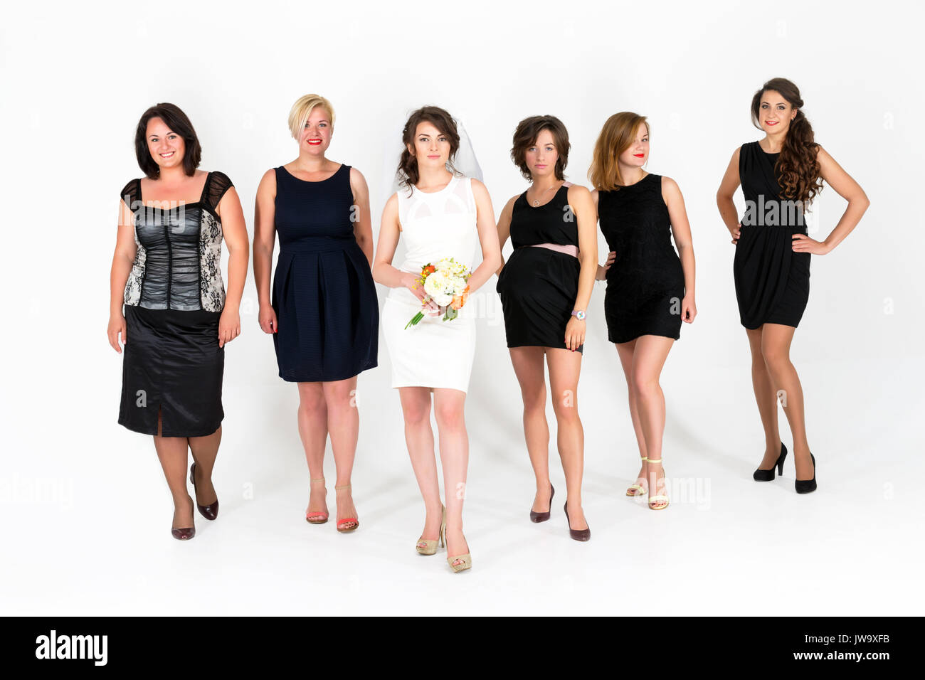 Stylish bridesmaids having fun with bride. Cheerful happy girls ...