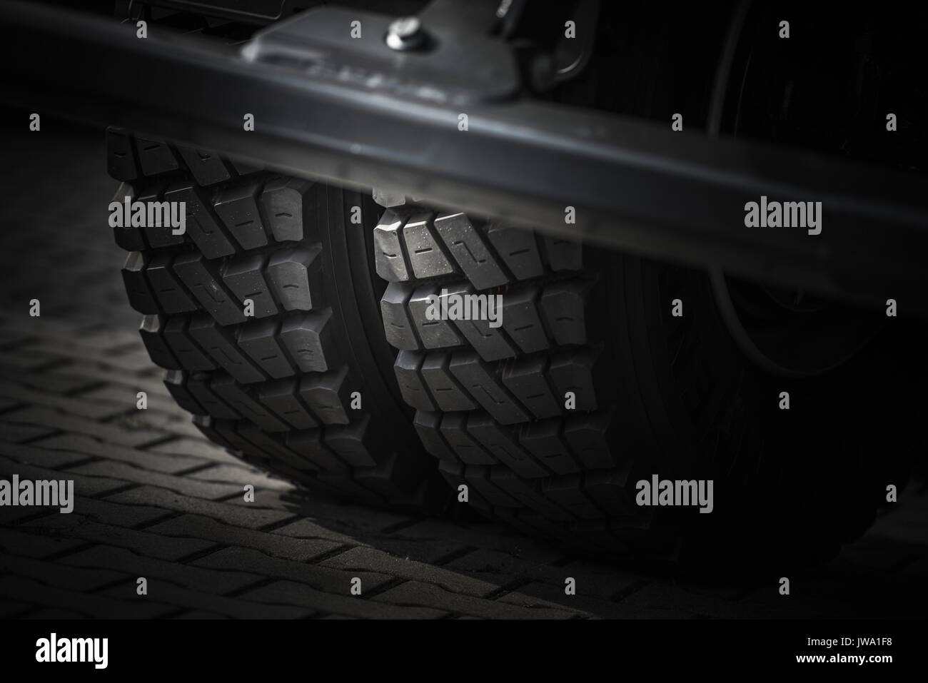 Heavy Duty Truck Tires Closeup Photo. Semi Truck Wheels Stock Photo - Alamy