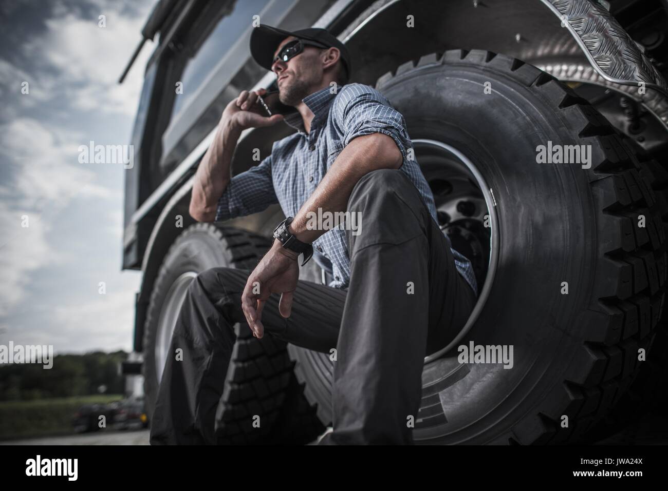 Truck Parts Ordering by Driver. Caucasian Truck Driver Ordering New ...