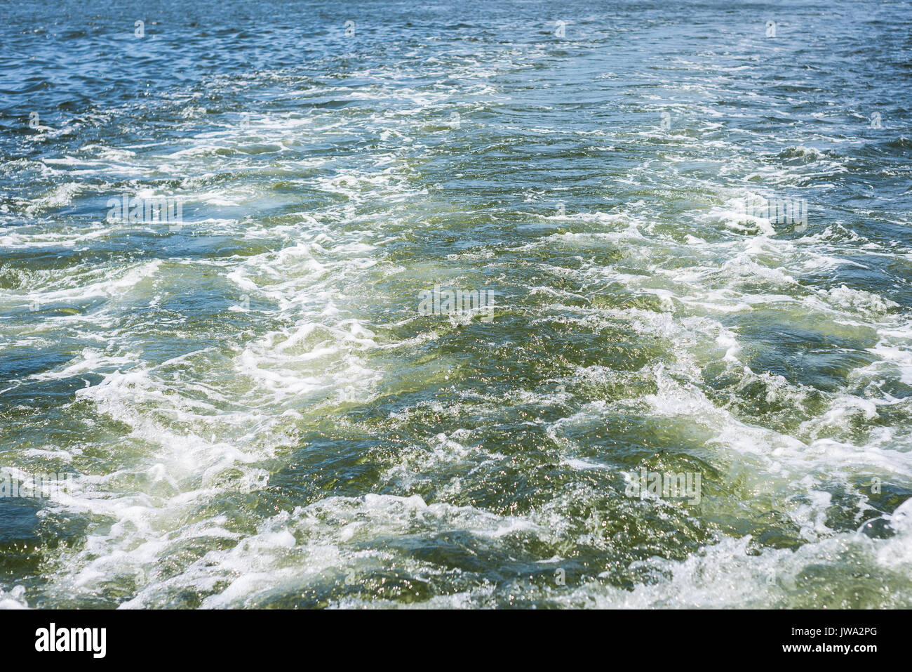 Wake of a ferry Stock Photo - Alamy