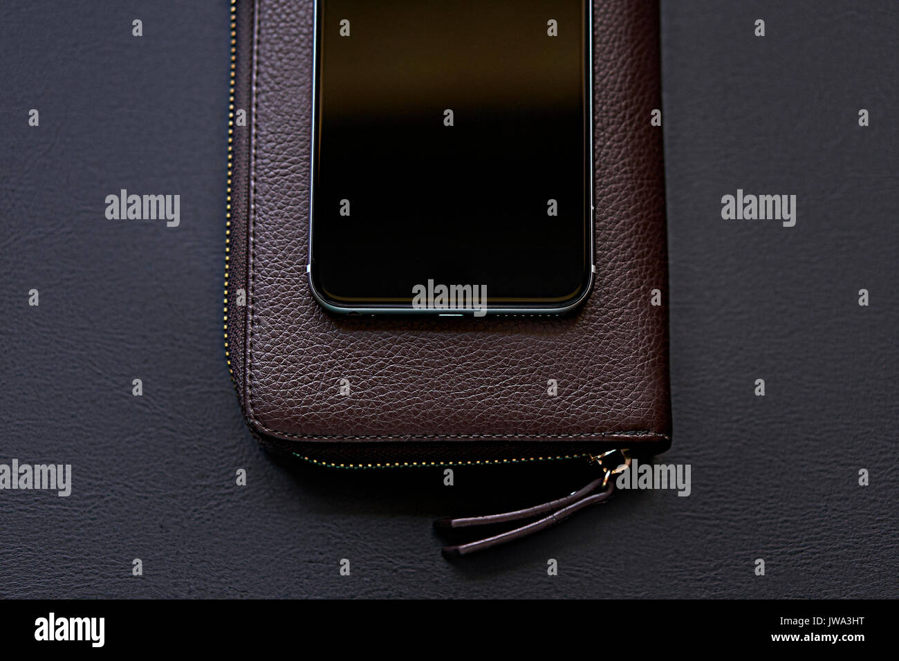 Closeup is the phone in the wallet is made of leather to your desktop ...