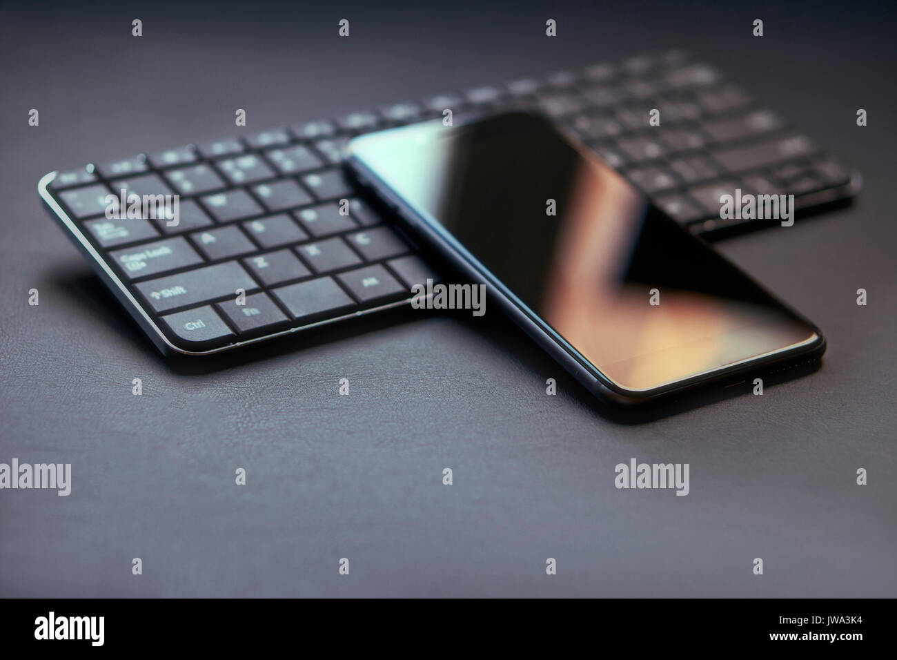 Cell phone tablet keyboard hi-res stock photography and images - Alamy