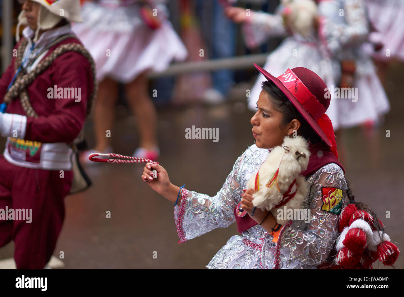 Llamerada dancers in ornate costumes performing as they parade through ...