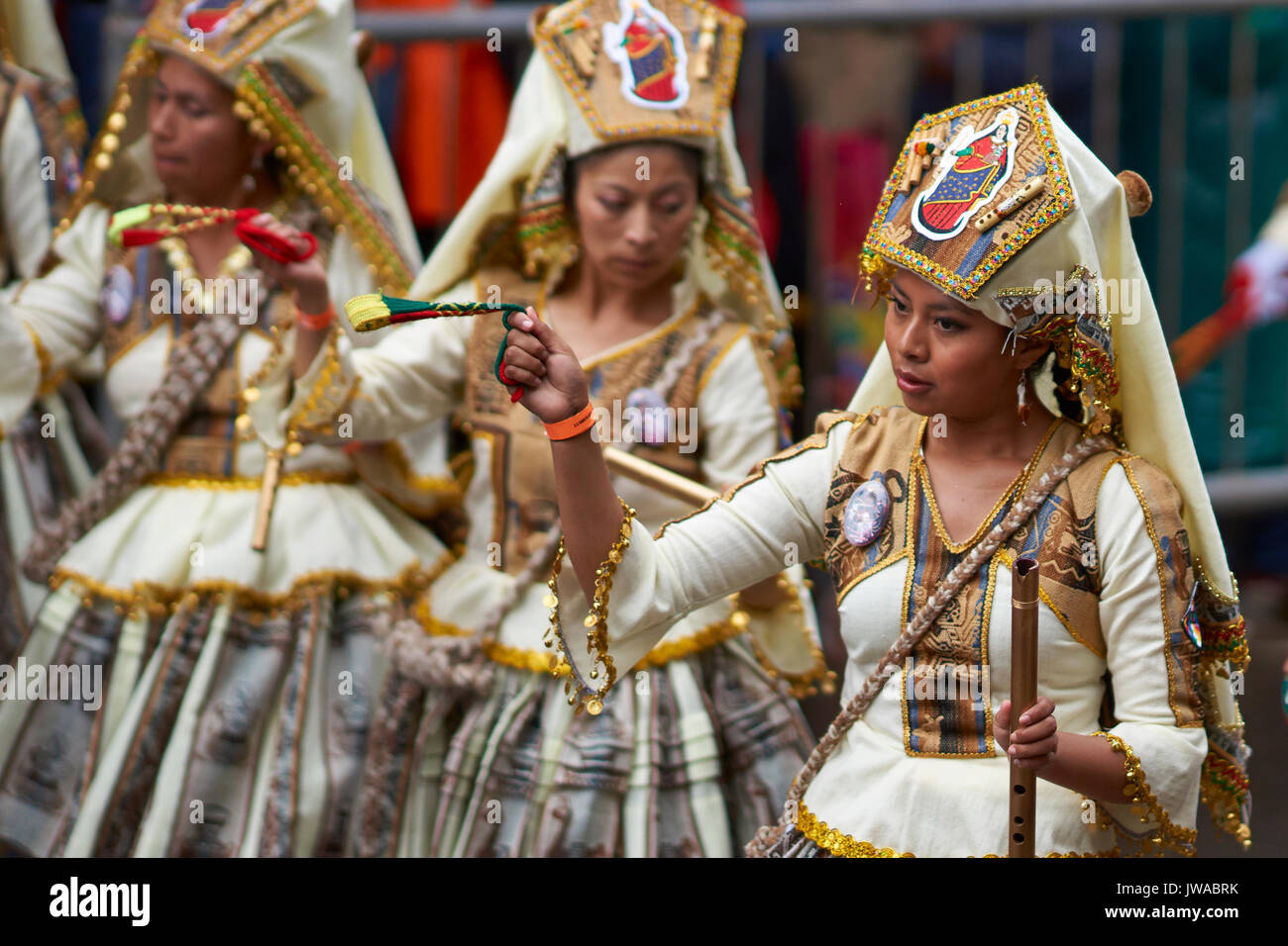 Llamerada dancers in ornate costumes performing as they parade through ...