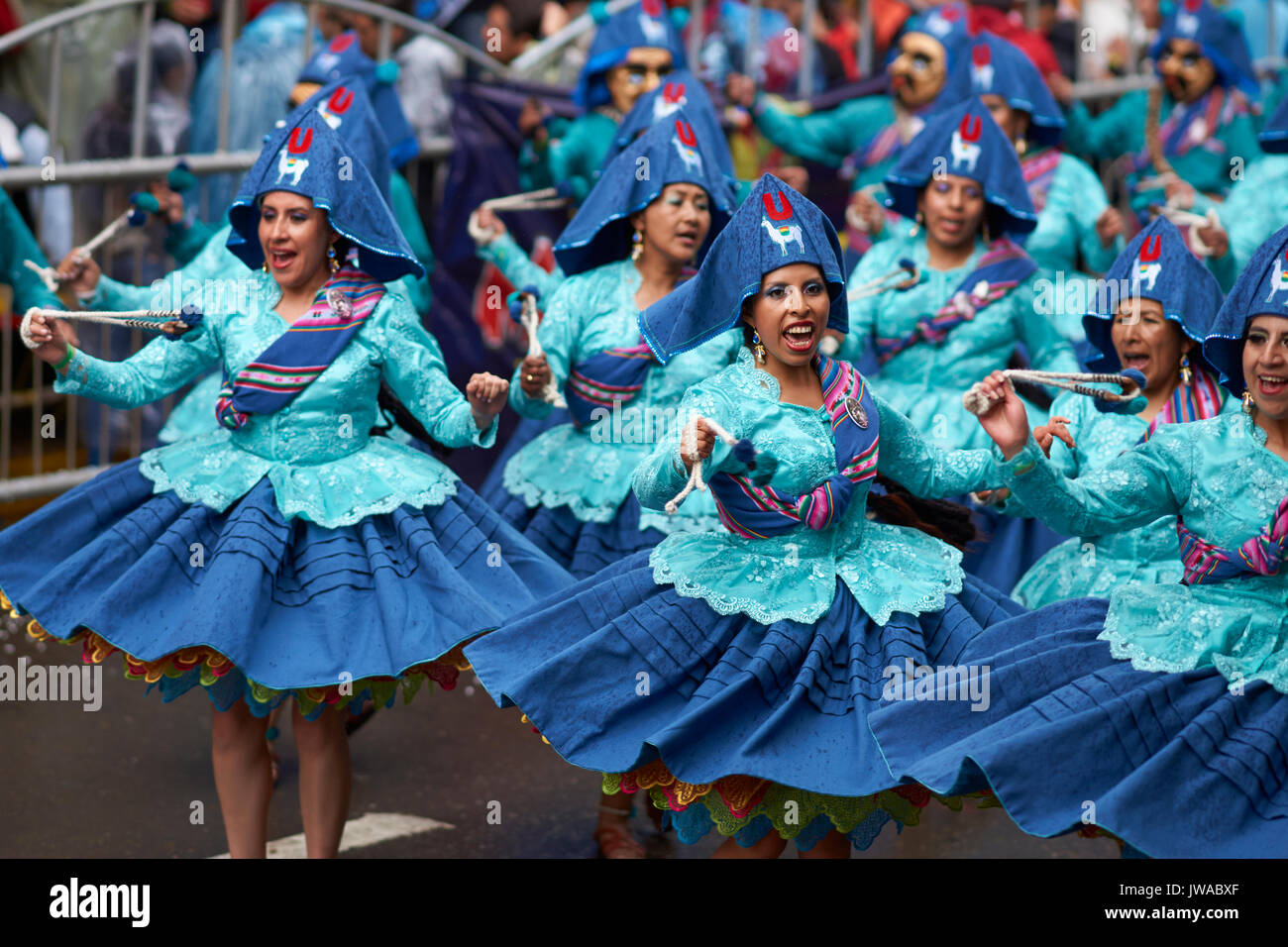 Llamerada dancers in ornate costumes performing as they parade through ...