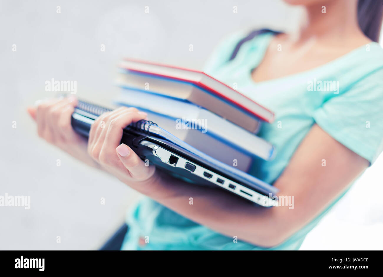 student with books, computer and folders Stock Photo - Alamy