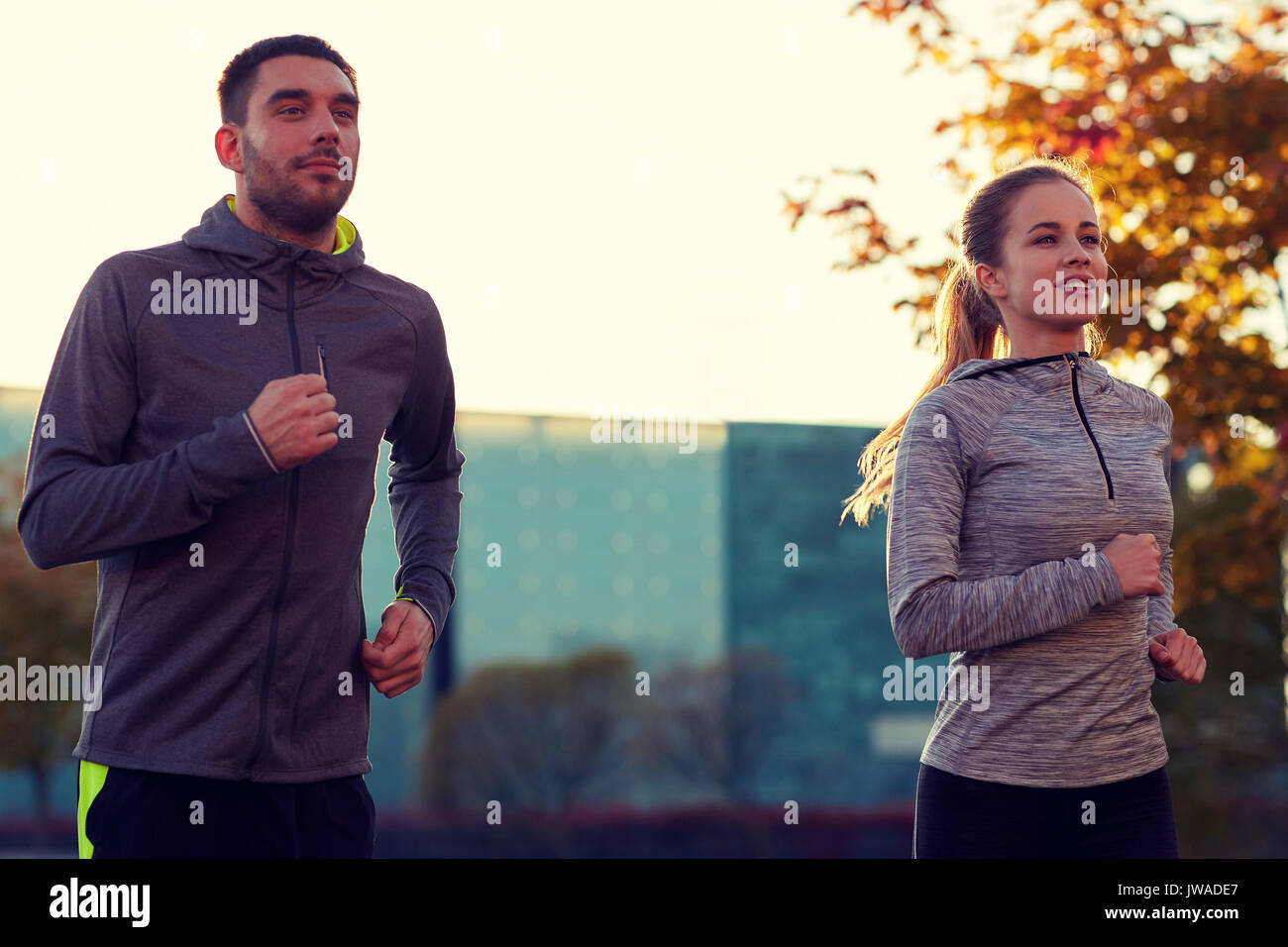Young woman team running hi-res stock photography and images - Alamy