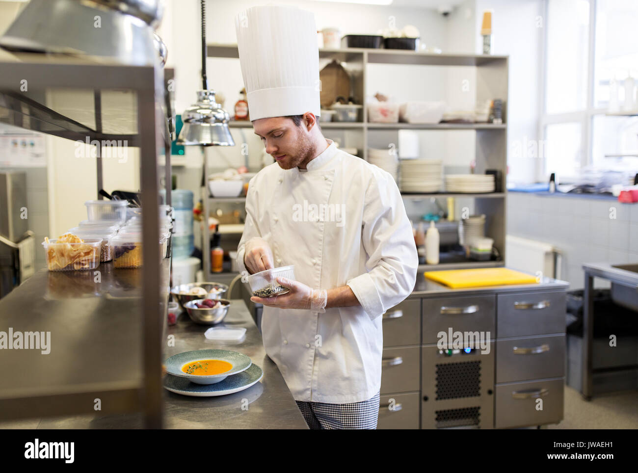 happy male chef cooking food at restaurant kitchen Stock Photo - Alamy