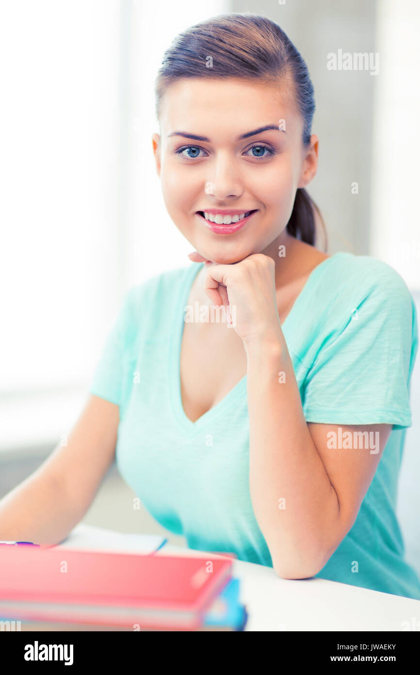 happy smiling student girl with books Stock Photo - Alamy
